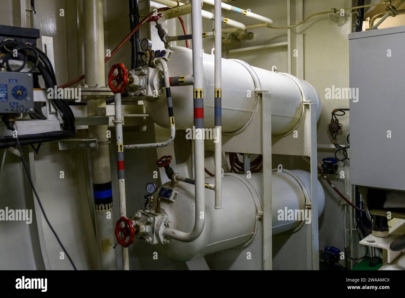 Air cylinders on ship. Engine room interior on big vessel Stock Photo ...