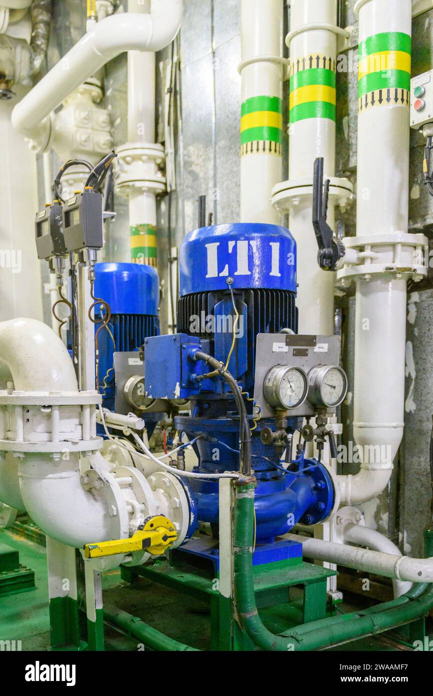 Water pump on ship. Engine room interior on big vessel Stock Photo - Alamy