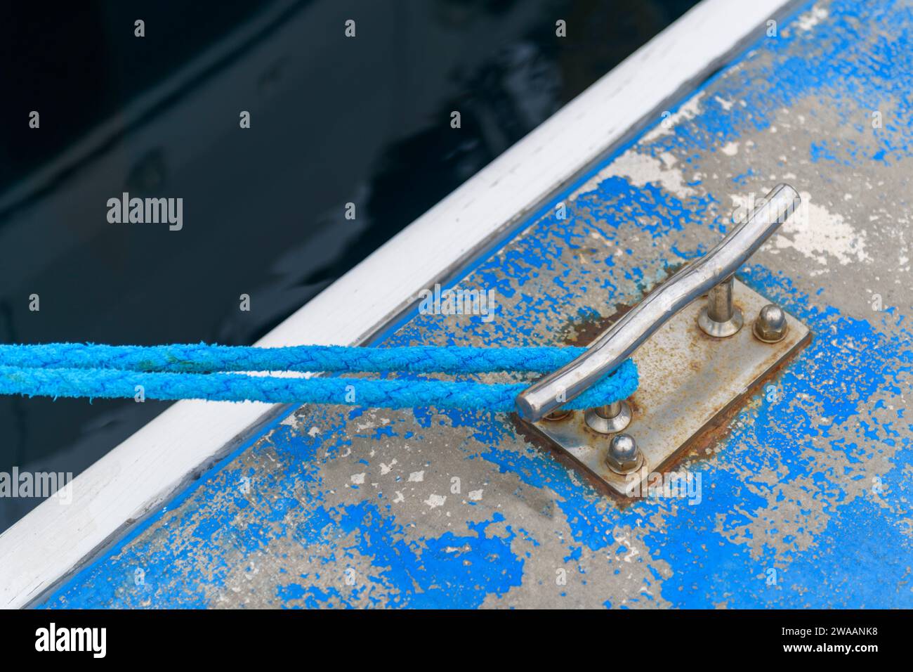 Cleat Hitch with blue rope. Marine hardware. Yachting concept Stock ...
