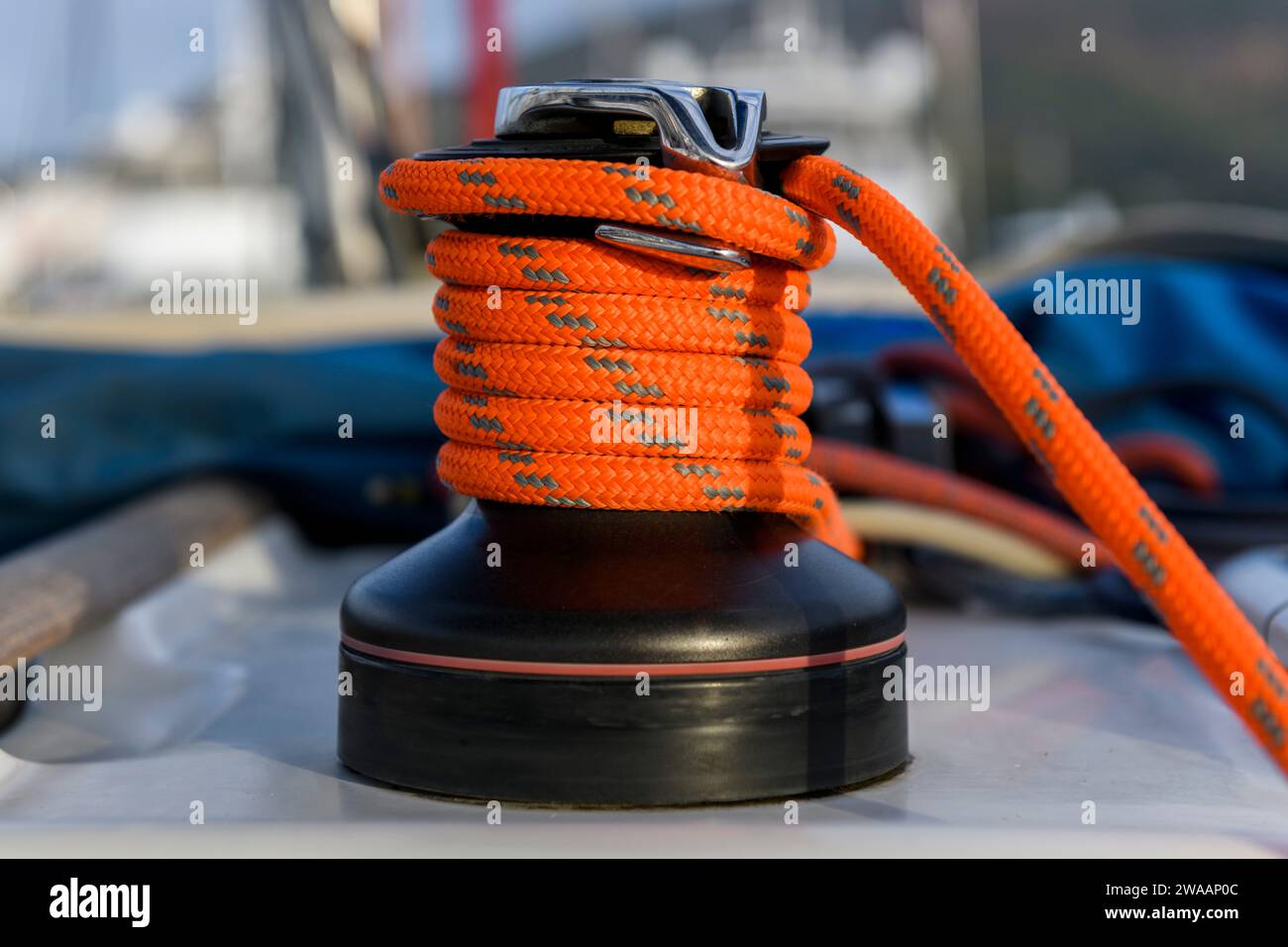 Yacht winch with orange rope on sailing boat. Yachting concept Stock ...
