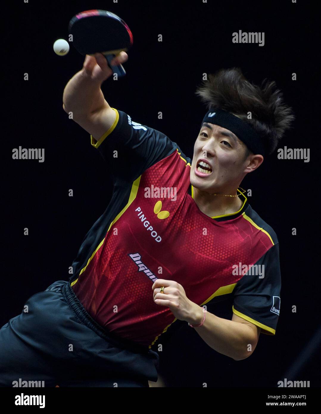 Doha, Qatar. 3rd Jan, 2024. Qiu Dang hits a return during the men's ...