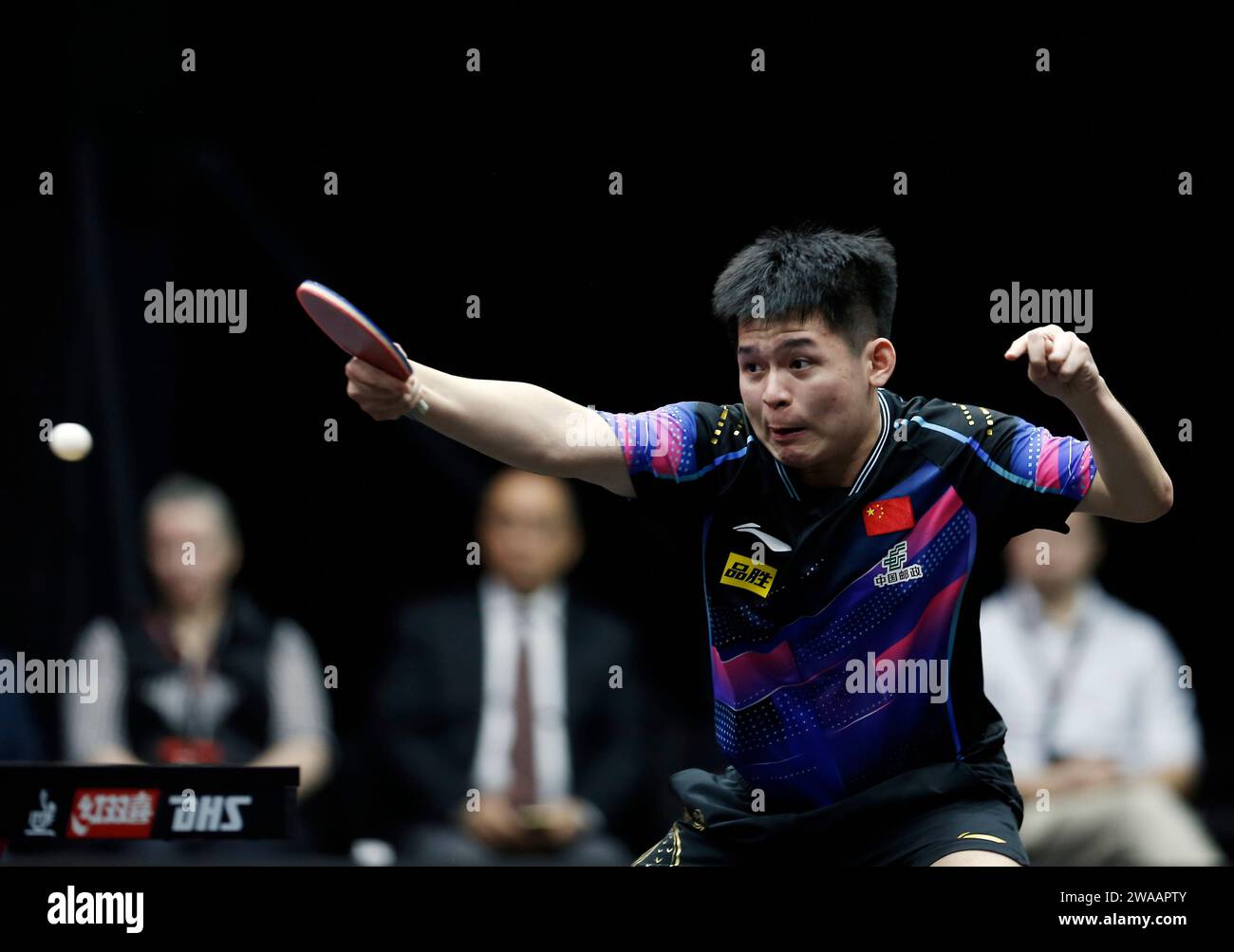 Doha, Qatar. 3rd Jan, 2024. Lin Shidong hits a return during the men's ...