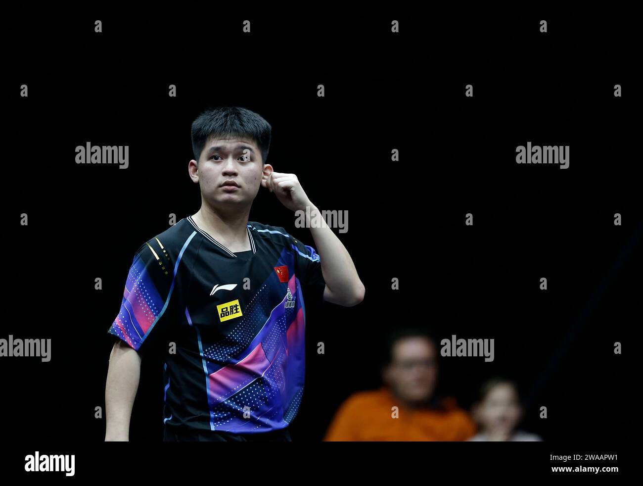 Doha, Qatar. 3rd Jan, 2024. Lin Shidong reacts during the men's singles ...