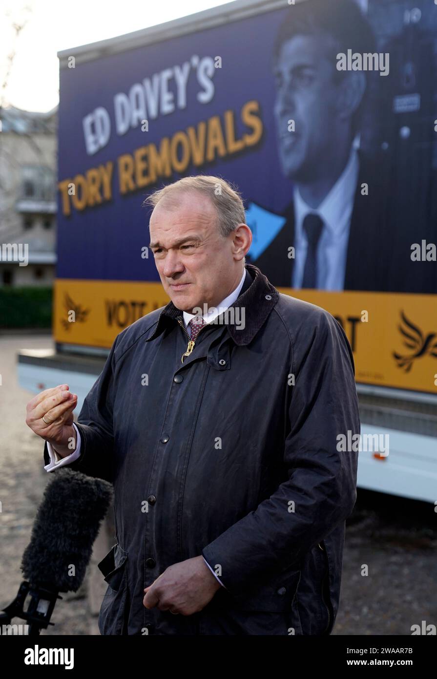 Liberal Democrat leader Sir Ed Davey speaks with members of the media ...