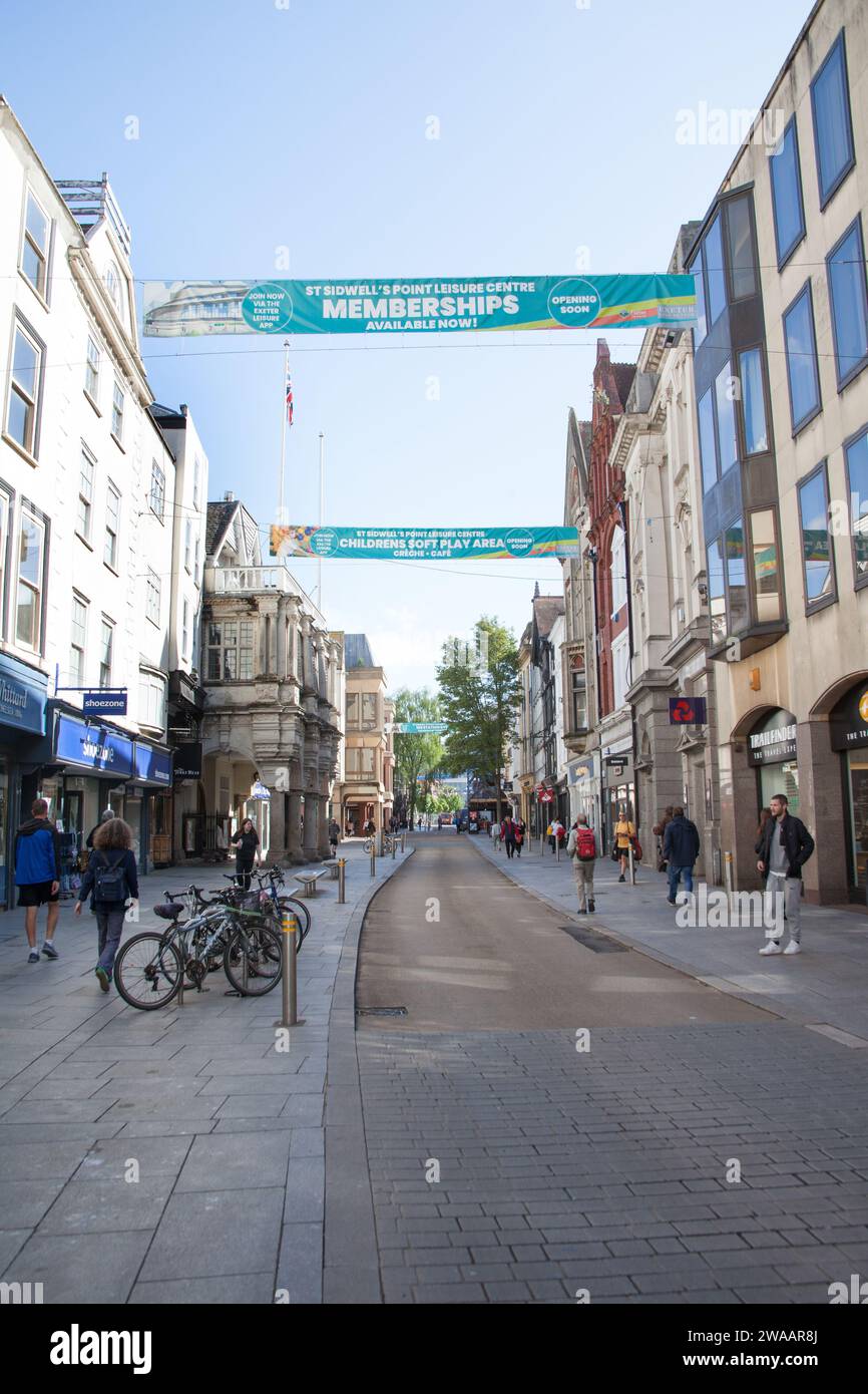 Views of people shopping on the High Street in Exeter, Devon in the UK ...