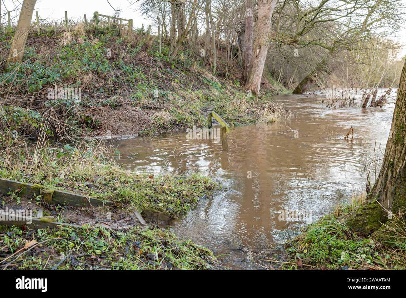 Teviot River flooding over a footbridge after storm Gerrit in December ...