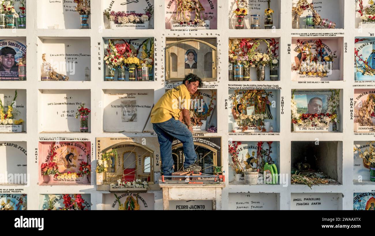 Ica, Peru - 24 October 2023: Grave keeper working at traditional ...