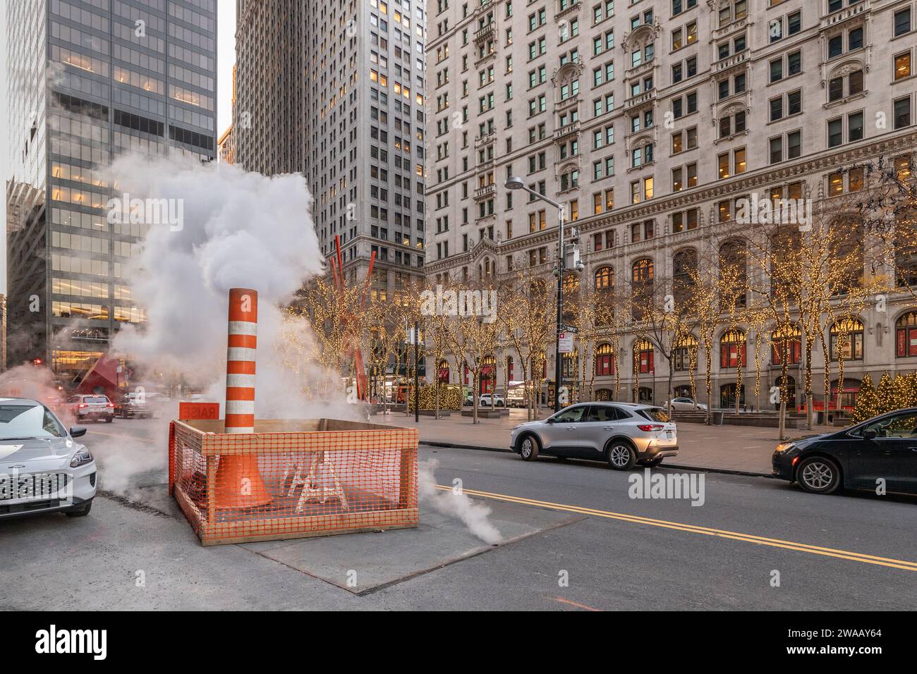 A steam stack and cars lining Liberty Street along Zuccotti Park, in ...