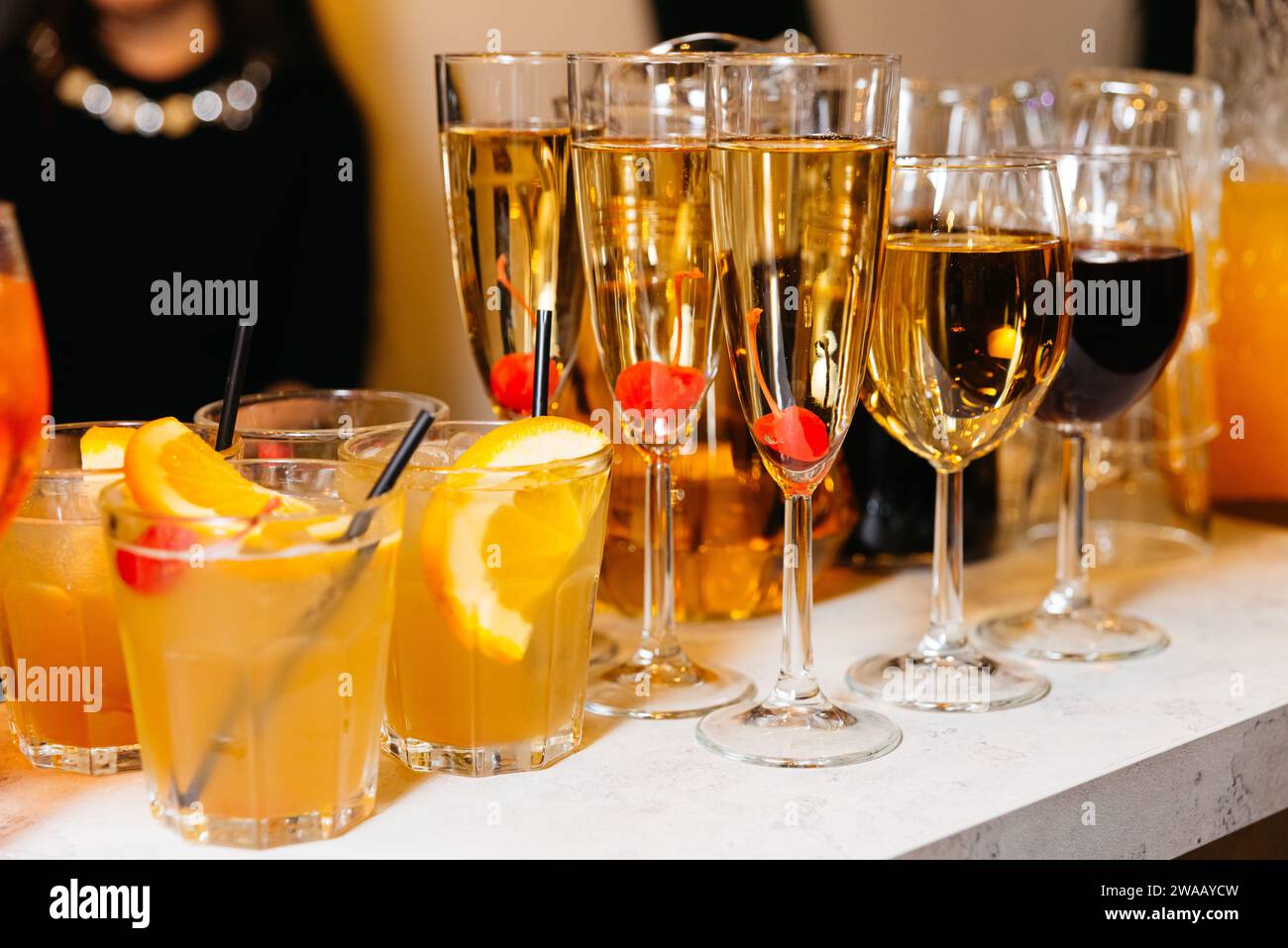 A selection of alcoholic beverages including champagne, wine, and ...