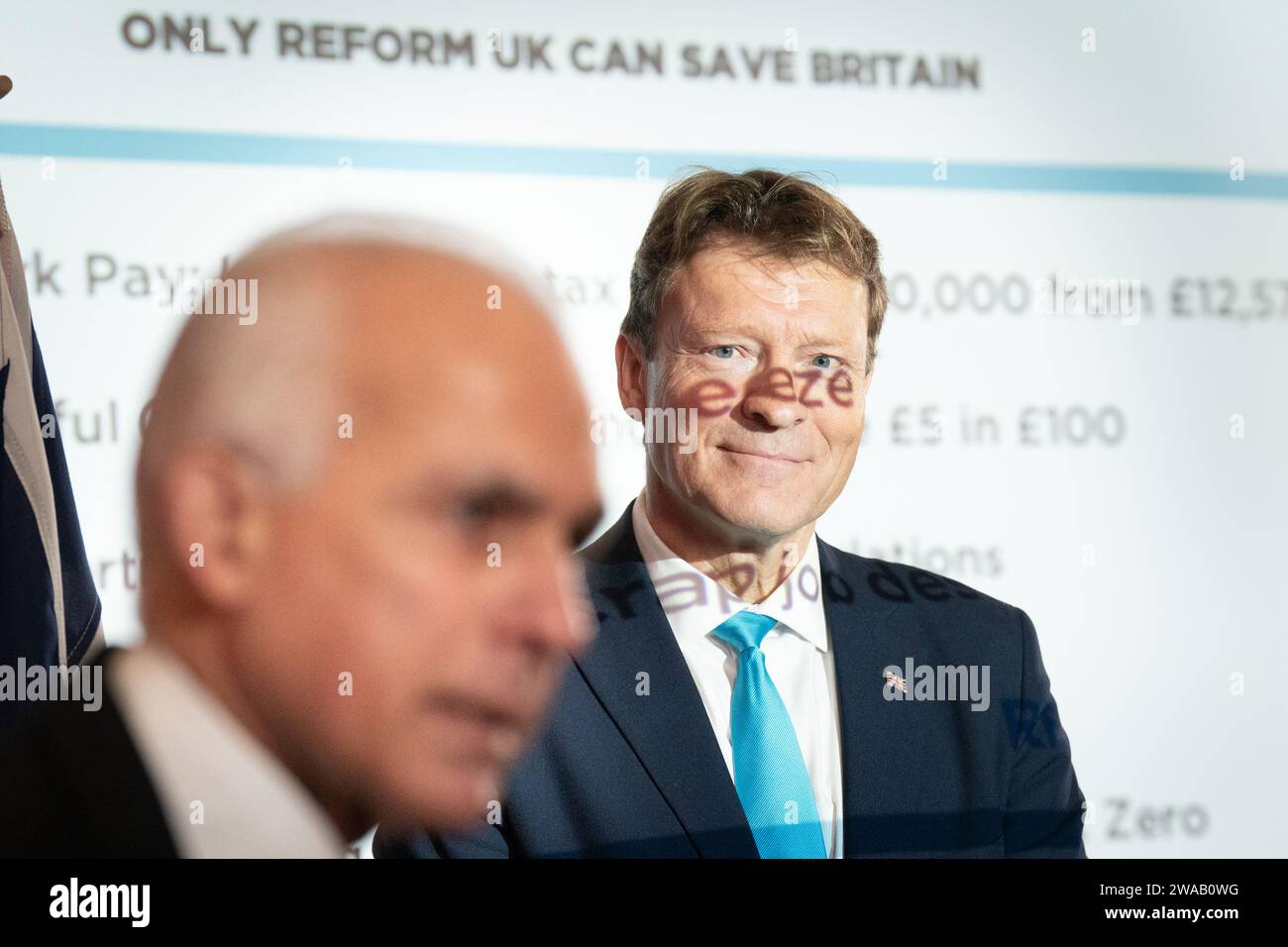 Reform Party leader Richard Tice (right) listens to his party’s ...
