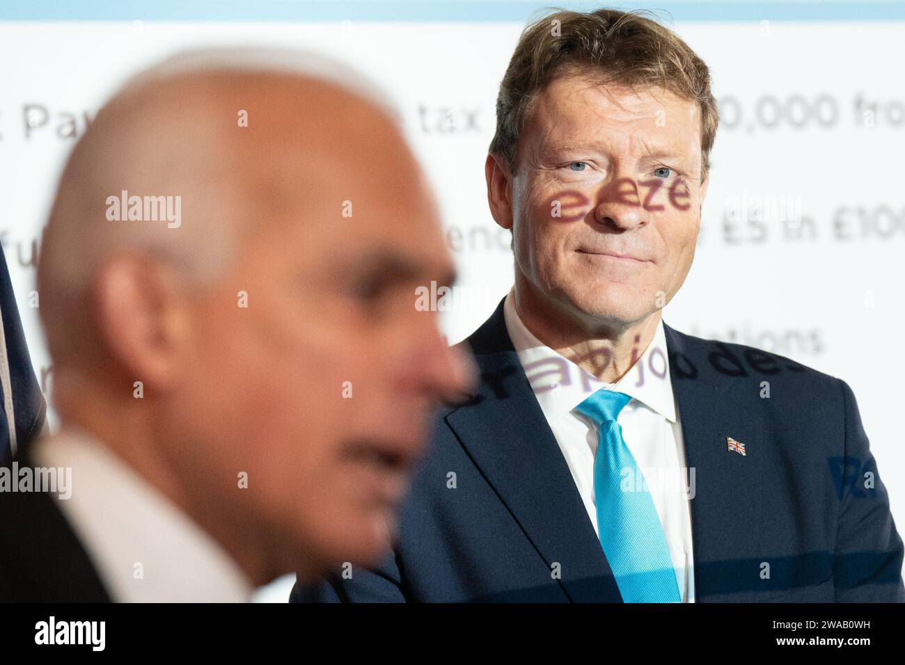 Reform Party leader Richard Tice (right) listens to his party’s ...