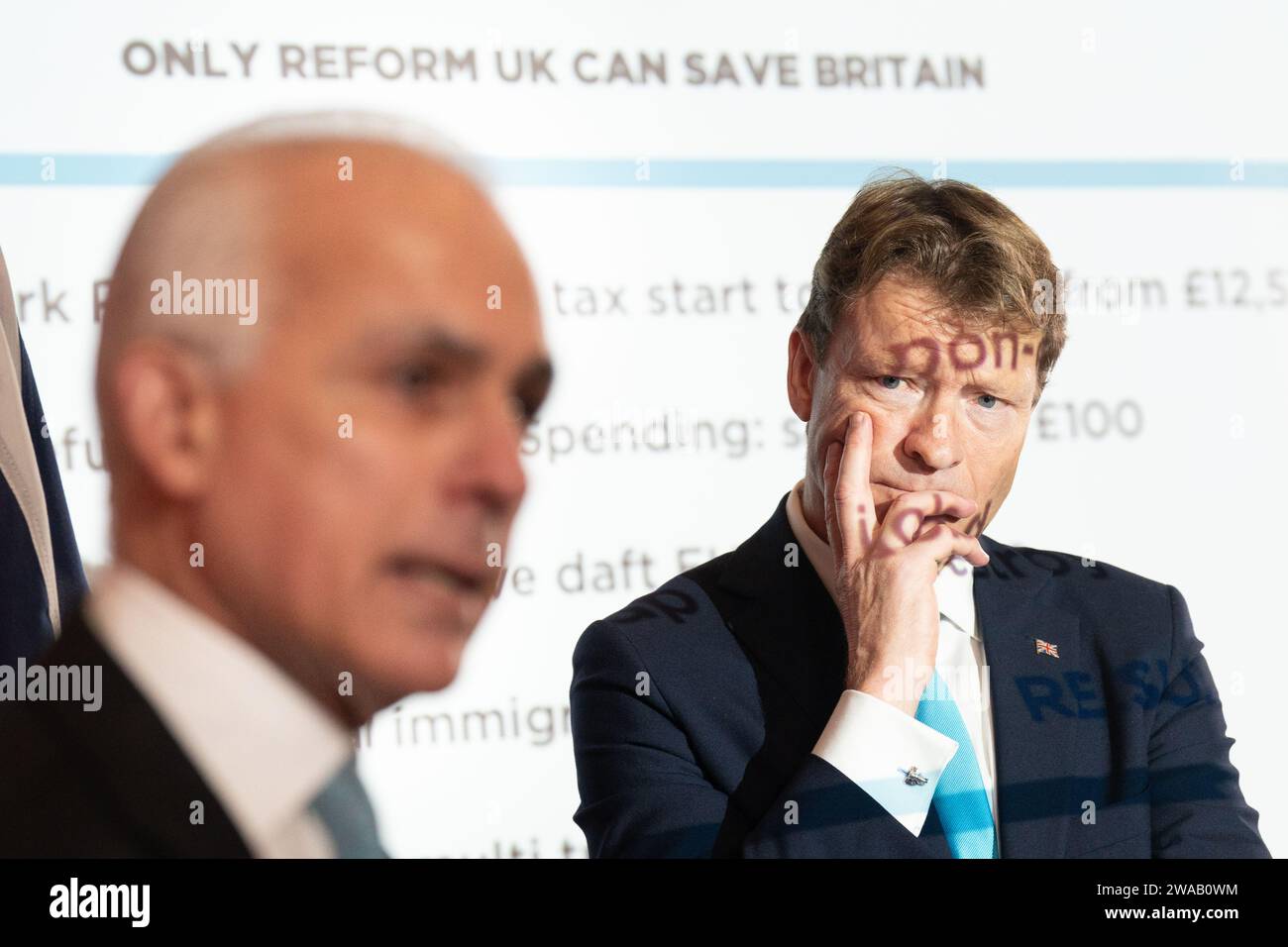 Reform Party leader Richard Tice (right) listens to his party’s ...