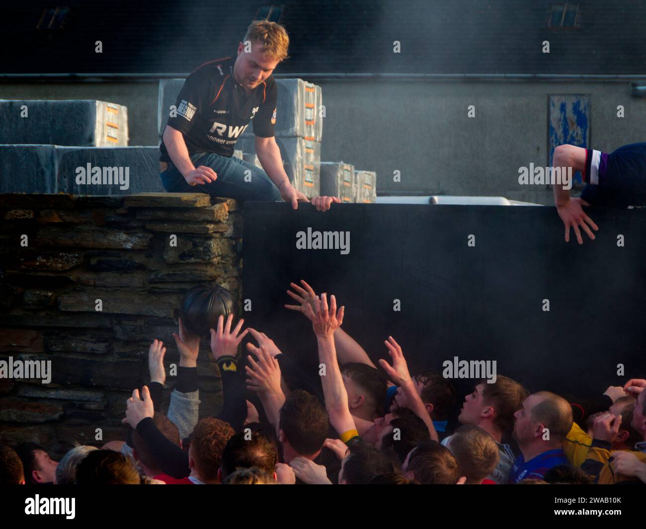 Stealing the Ba, Kirkwall New Year street game 2024 Stock Photo - Alamy