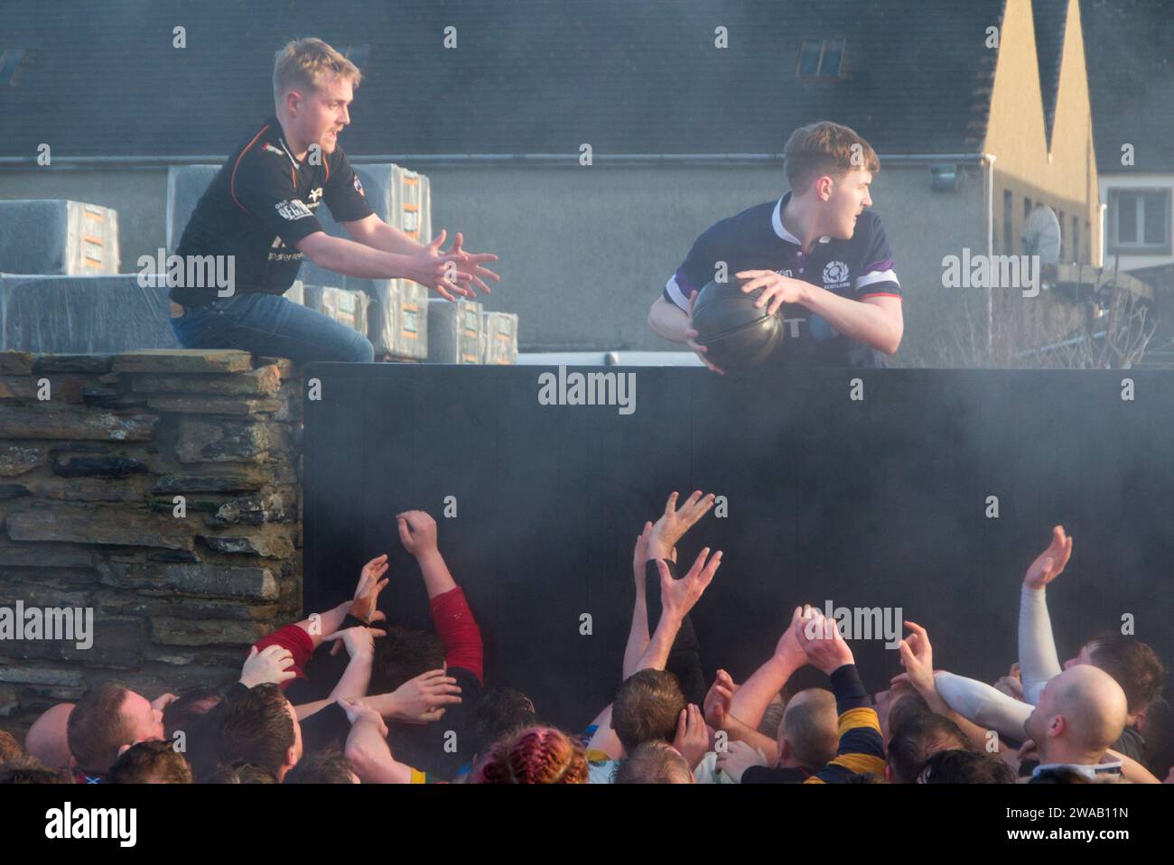 Stealing the Ba, Kirkwall New Year street game 2024 Stock Photo - Alamy