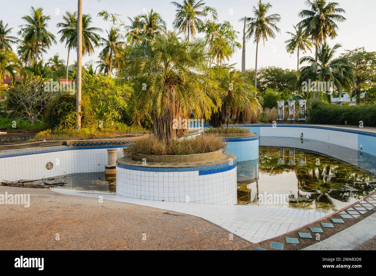 General view of an abandoned swimming pool area, at the beachfront of ...