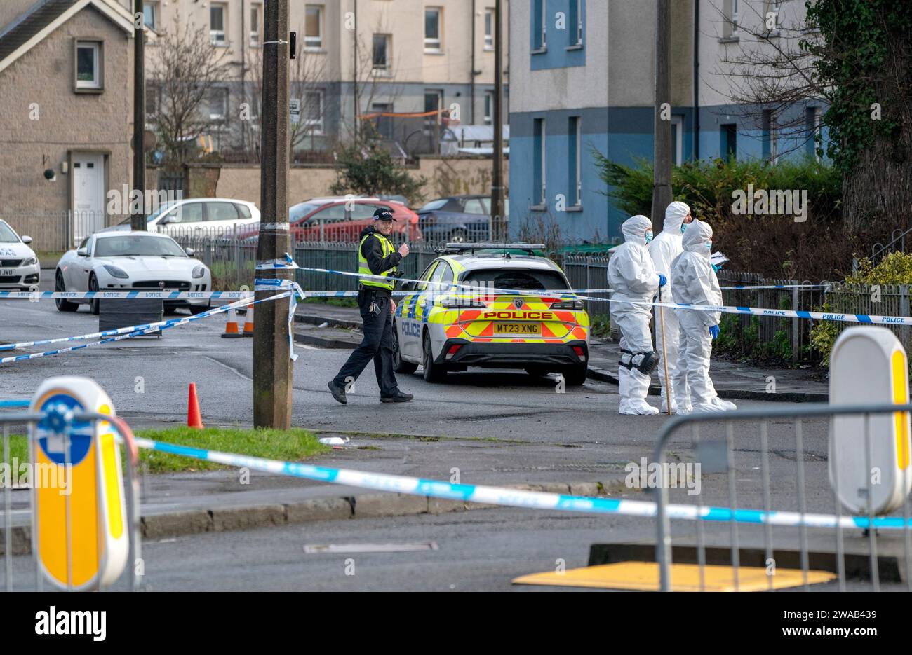 Police forensic officers search the area close to the scene near the ...