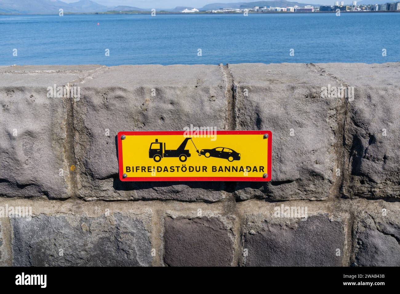 Icelandic sign (English translation - Towing Zone) in downtown ...