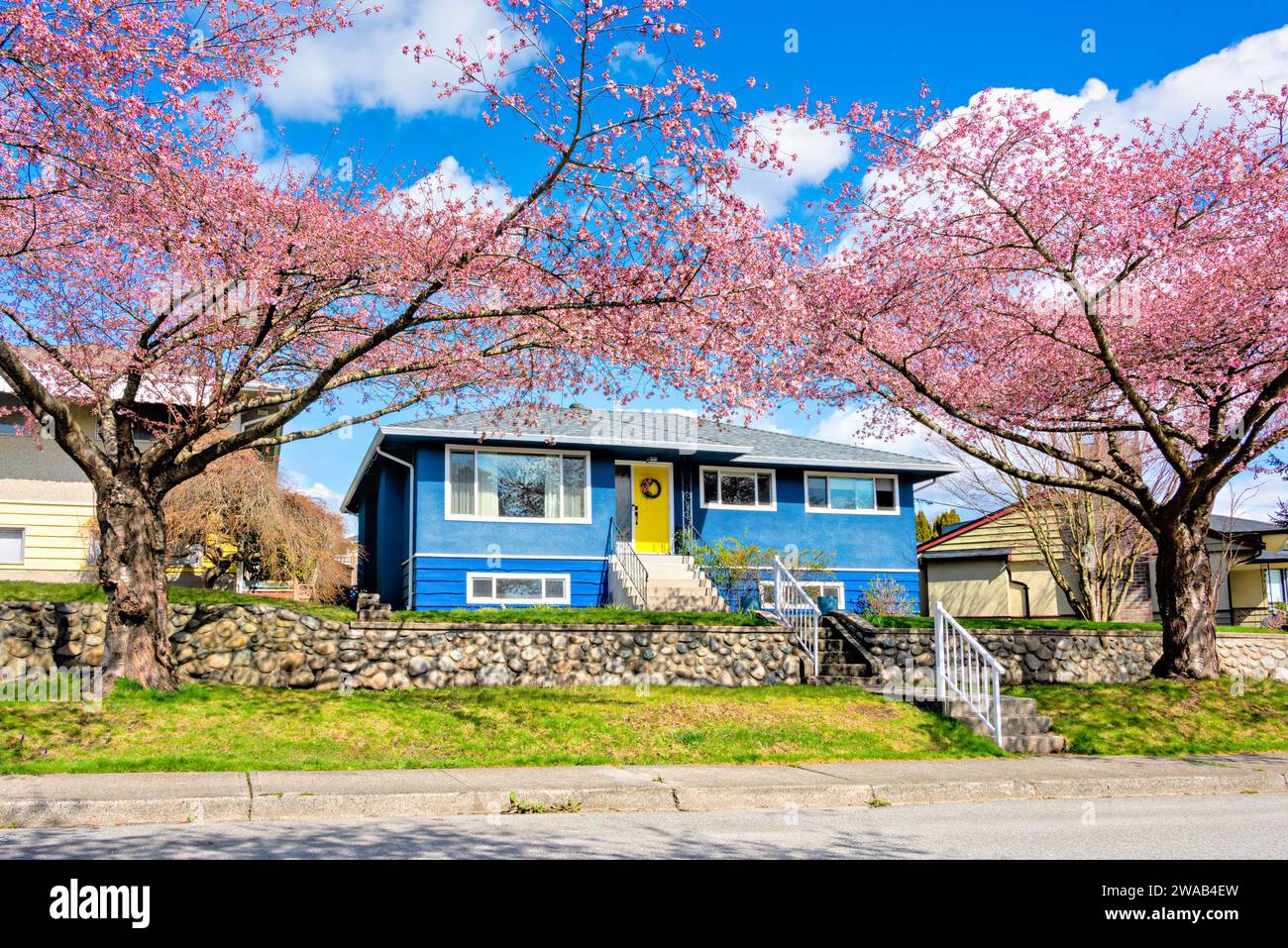 Average single family house with front yard on land terrace Stock Photo ...