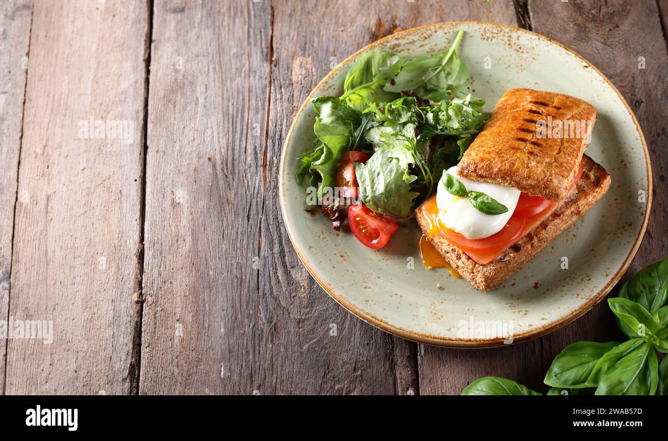 breakfast with paninni and poached egg Stock Photo - Alamy