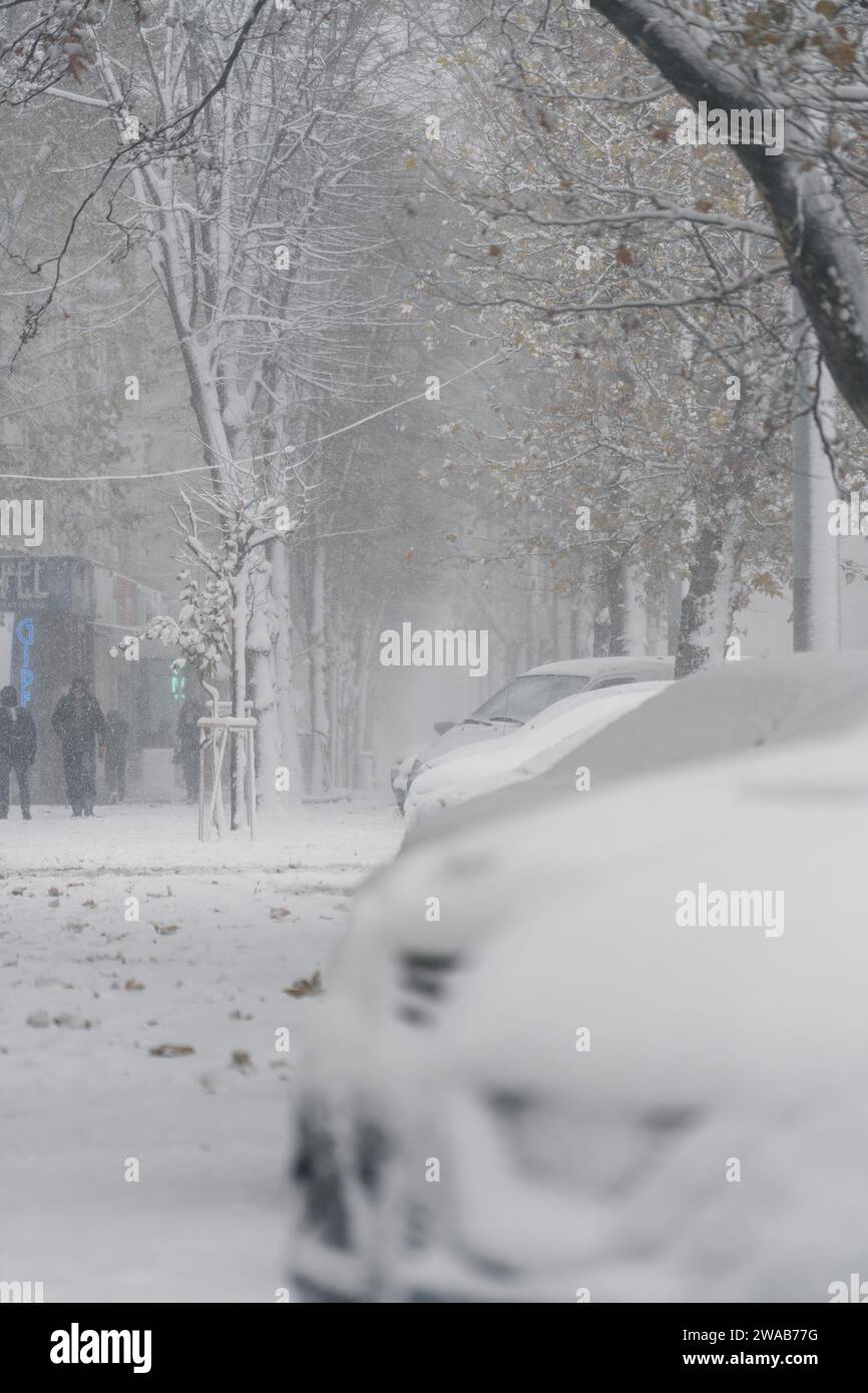 City street under the snow during snow blizzard in winter Stock Photo ...