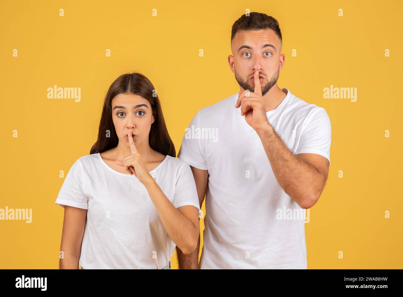 Woman making shush gesture hi-res stock photography and images - Alamy