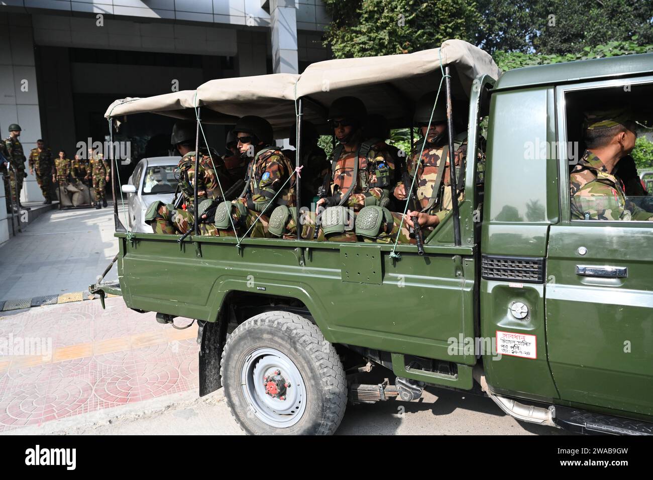 Dhaka, Bangladesh. 03rd Jan, 2024.Bangladesh Army personnel sit in the ...