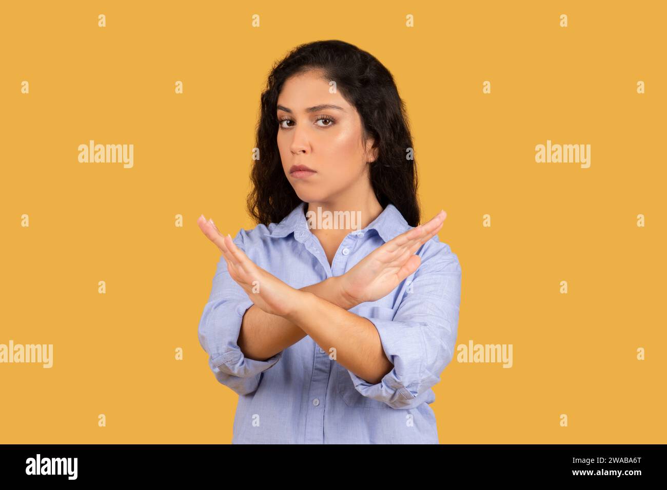 Woman cross arms x hi-res stock photography and images - Alamy