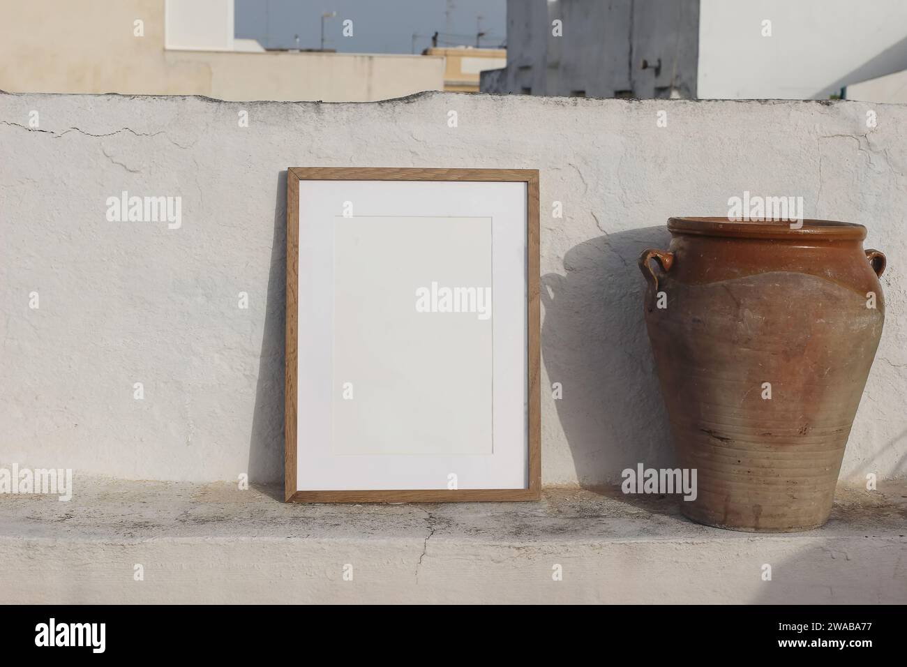 Blank vertical wooden frame picture mock up with vintage olive clay ...