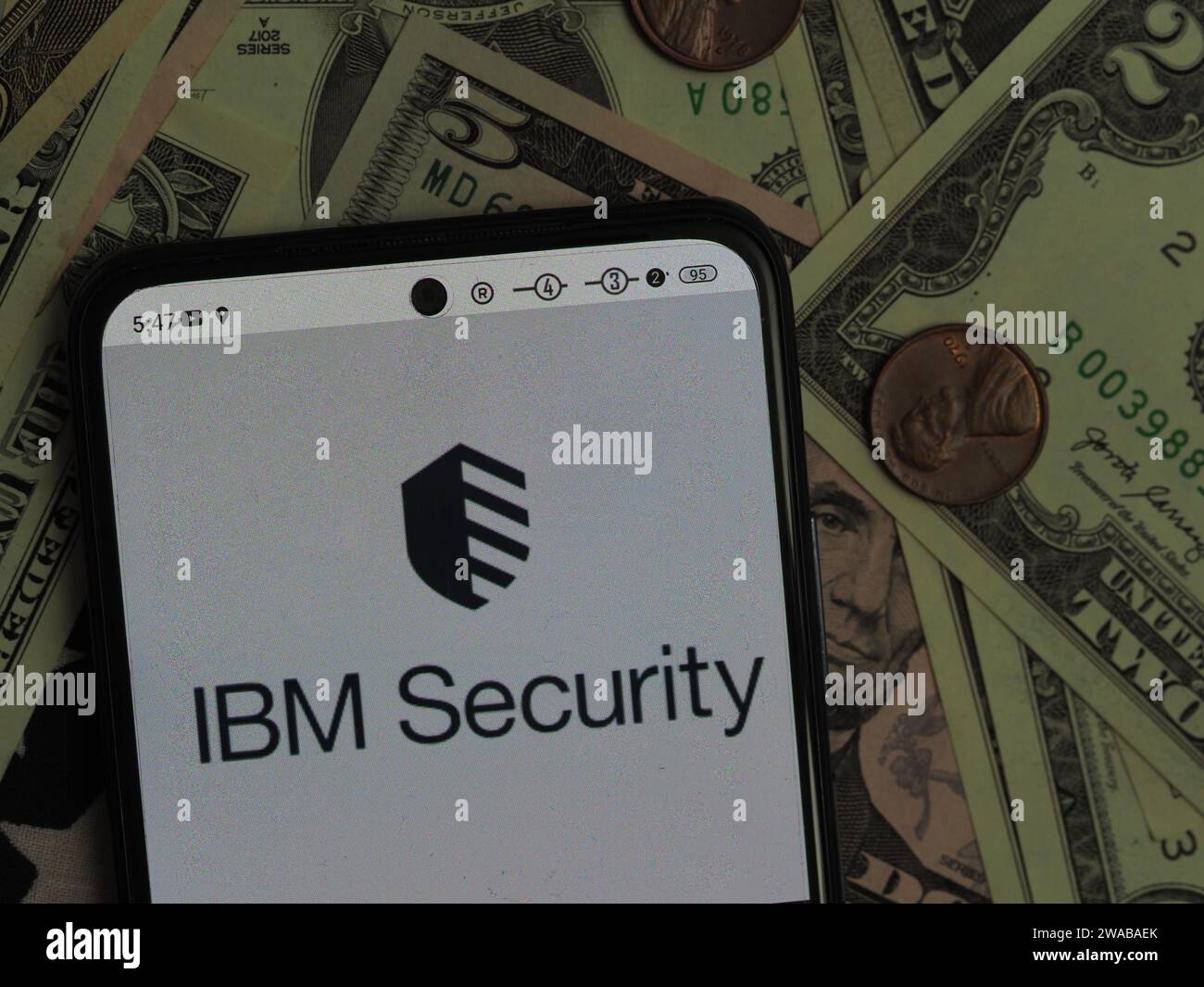 In this photo illustration, an IBM Security logo seen displayed on a ...