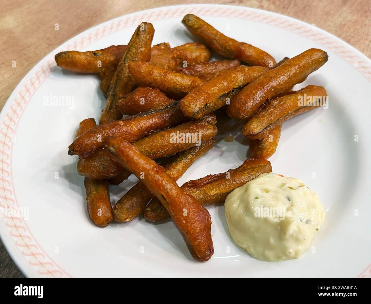 Gobo no karaage or fried burdock root - a Japanese food Stock Photo - Alamy