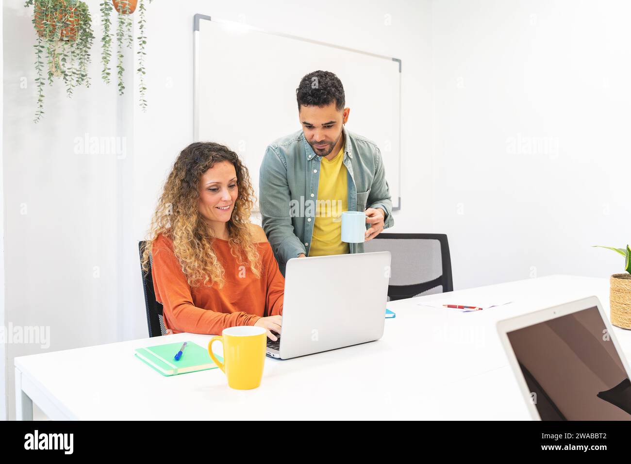 Engaged team members collaborate in hi-res stock photography and images ...