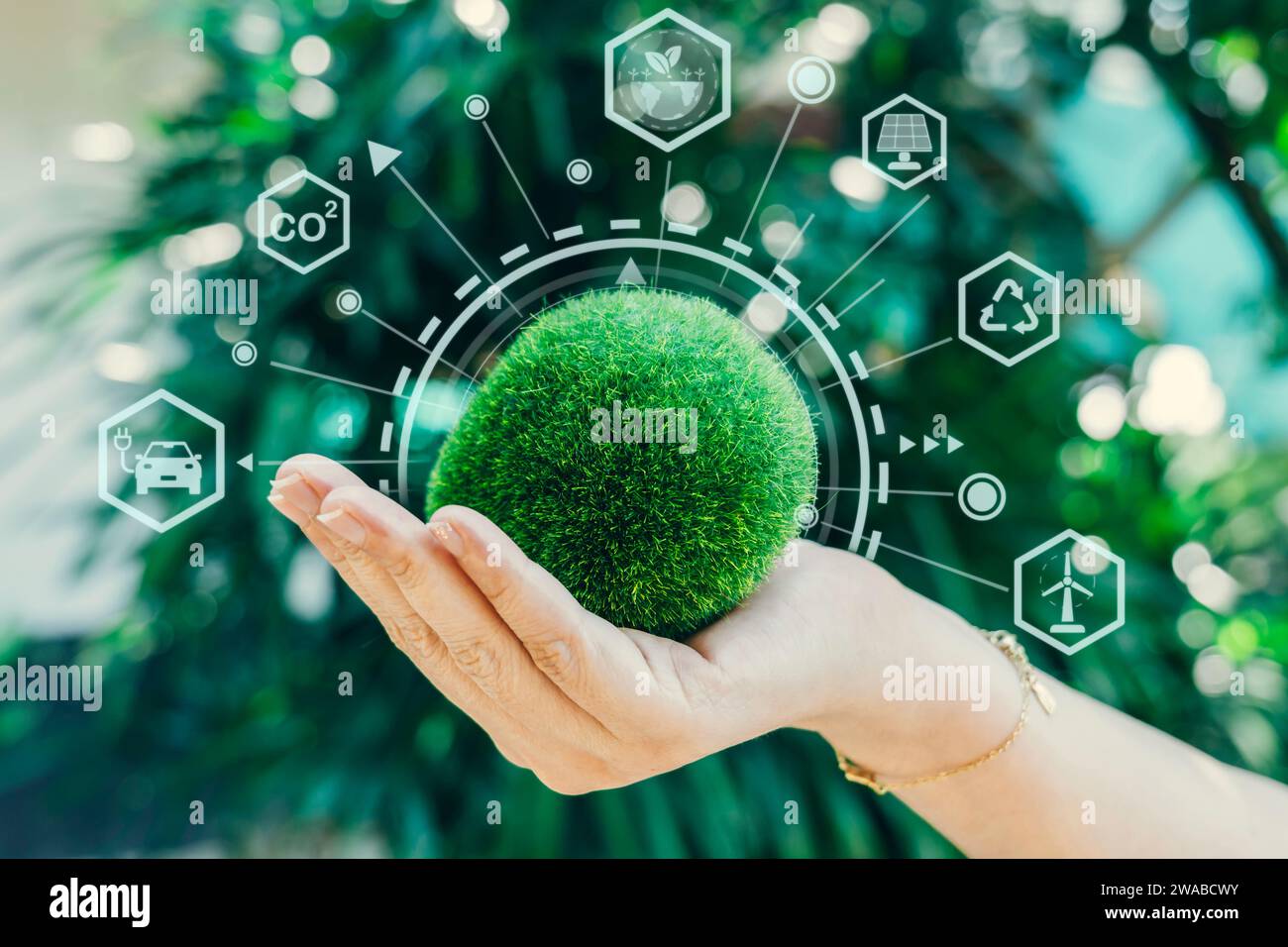 Hand holding green earth ESG icon for environment social network and ...