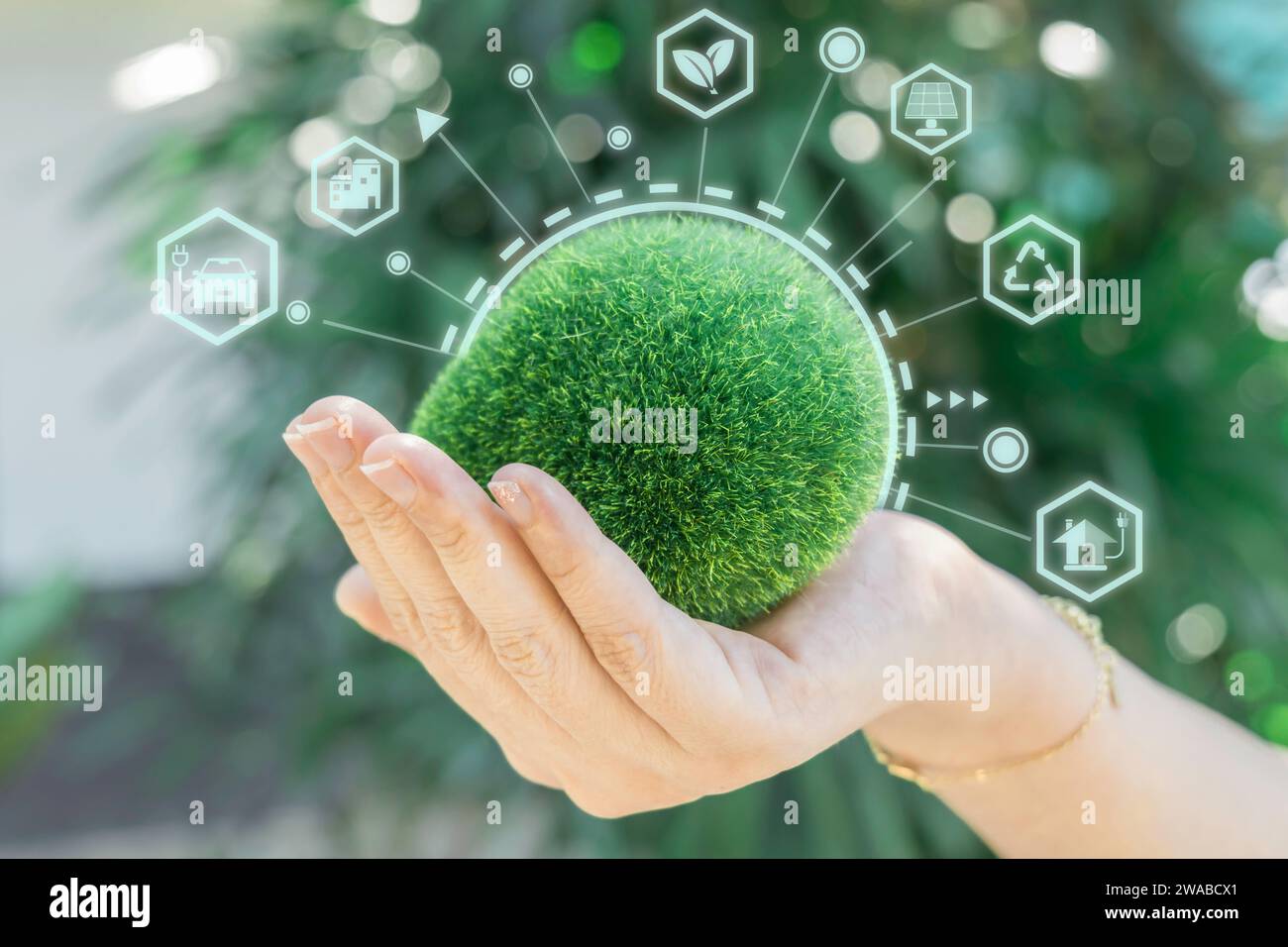 Hand holding green earth ESG icon for environment social network and ...