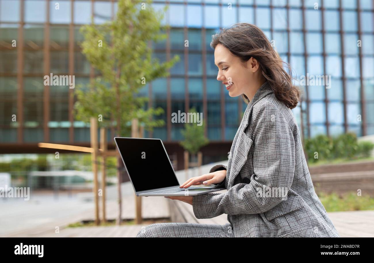 Side view young businesswoman browsing hi-res stock photography and ...