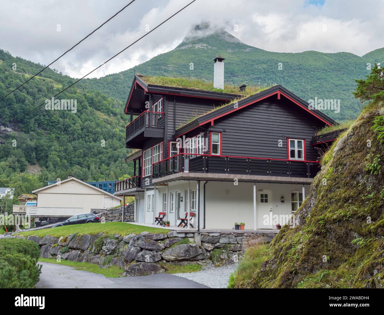 A large house with a sod roof or turf roof, is a traditional ...