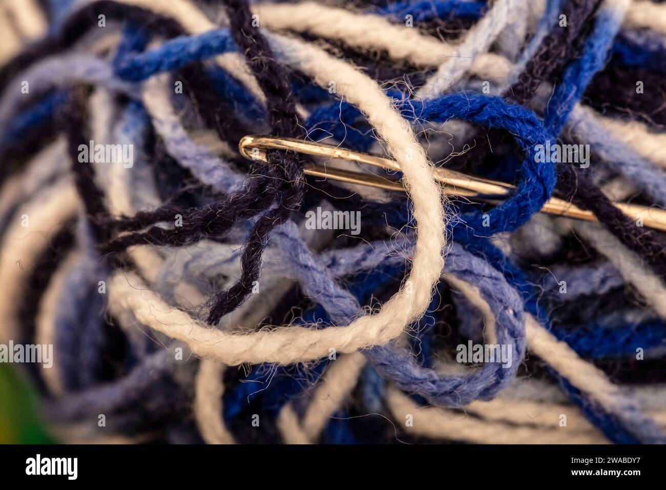 Very close up, macro, still life of colourful wood and needle, high ...