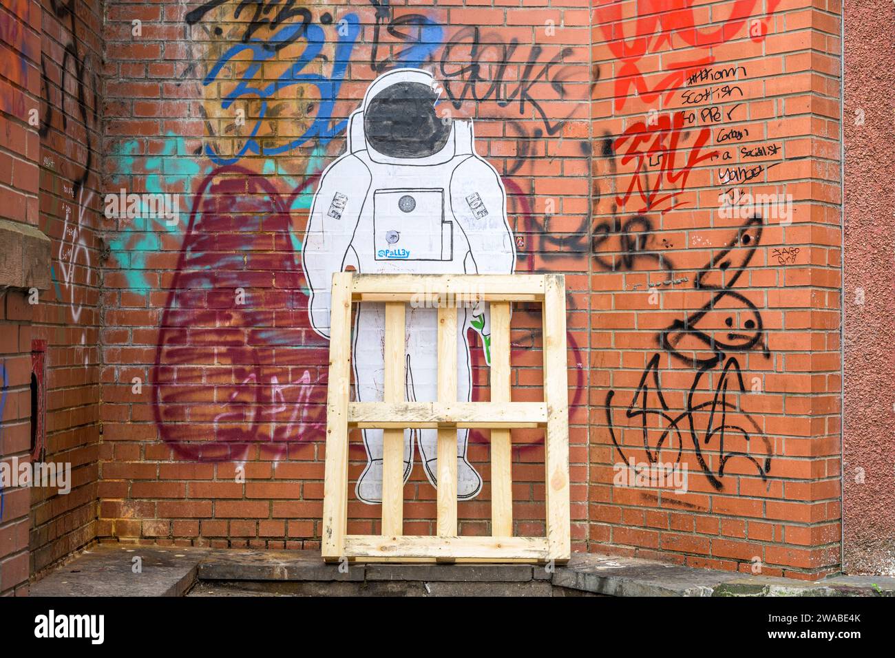 Astronaut graffiti paste up by street artist Pall3y, Springfield Court ...