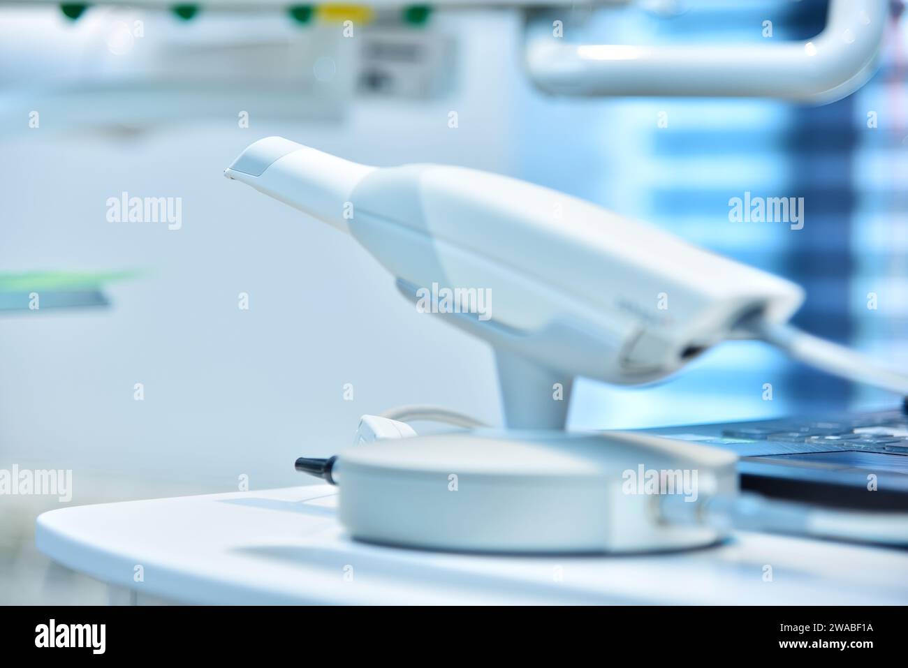 Intraoral scanner on table in modern dentist office. Dentistry and ...