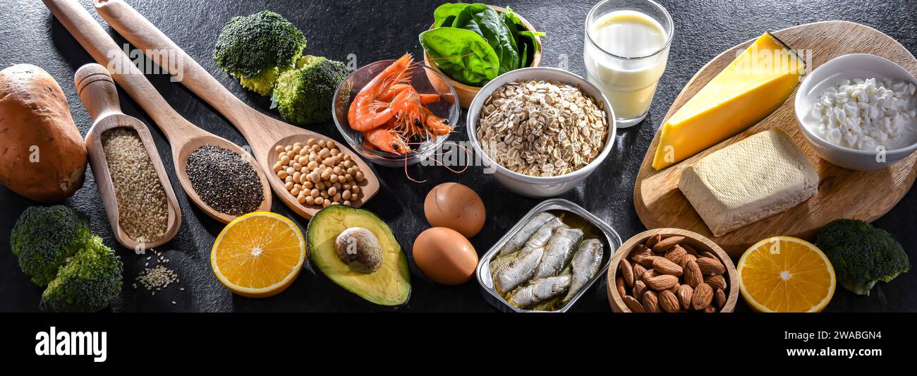 Composition with food products rich in calcium Stock Photo - Alamy