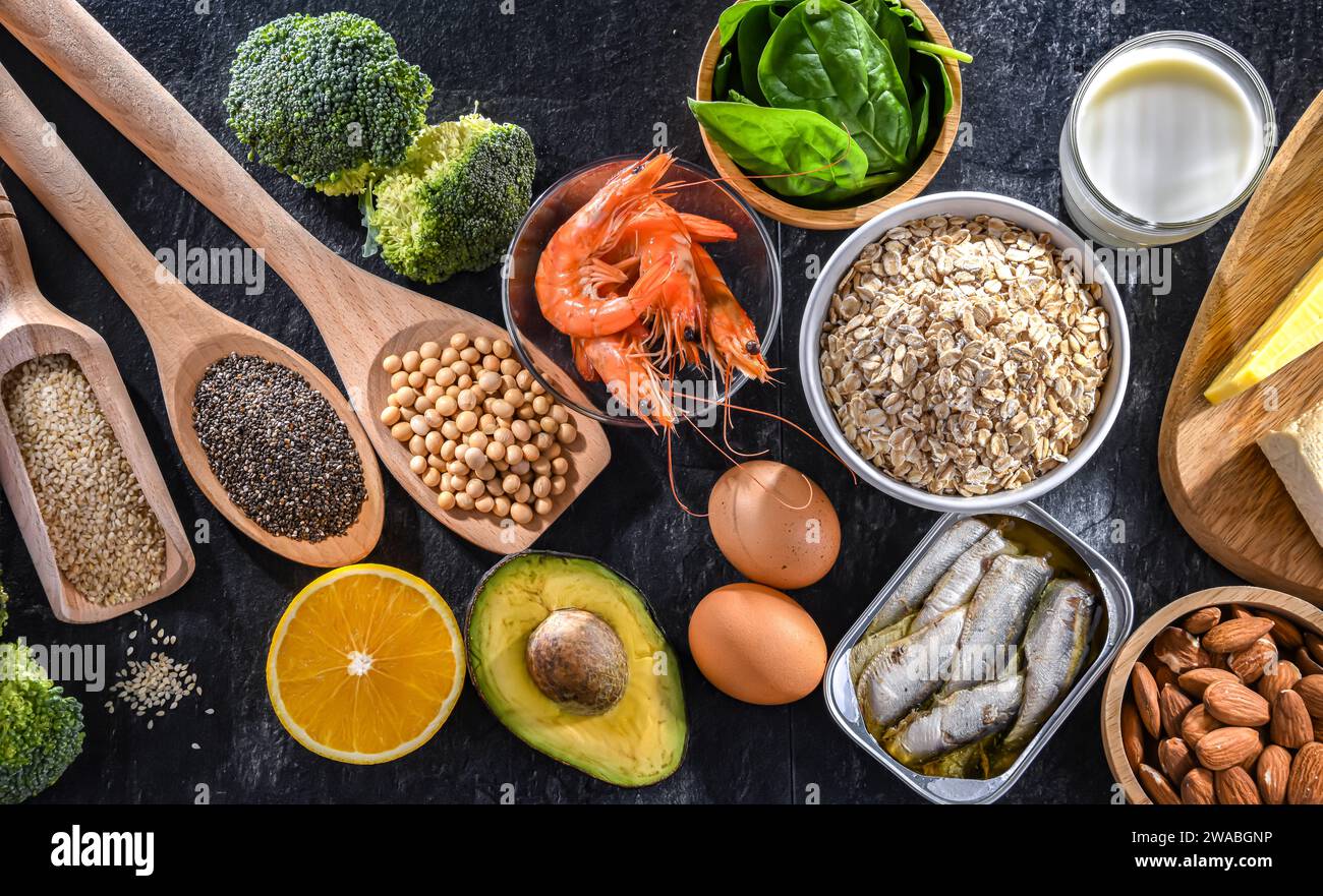 Composition with food products rich in calcium Stock Photo - Alamy