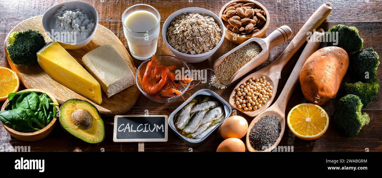 Composition with food products rich in calcium Stock Photo - Alamy
