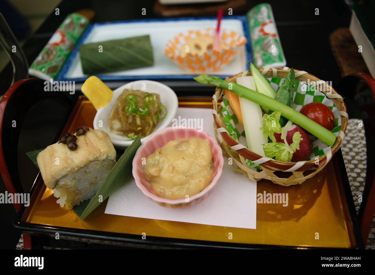 A salad, eel on rice, custard pudding, and vegetable jelly Stock Photo ...