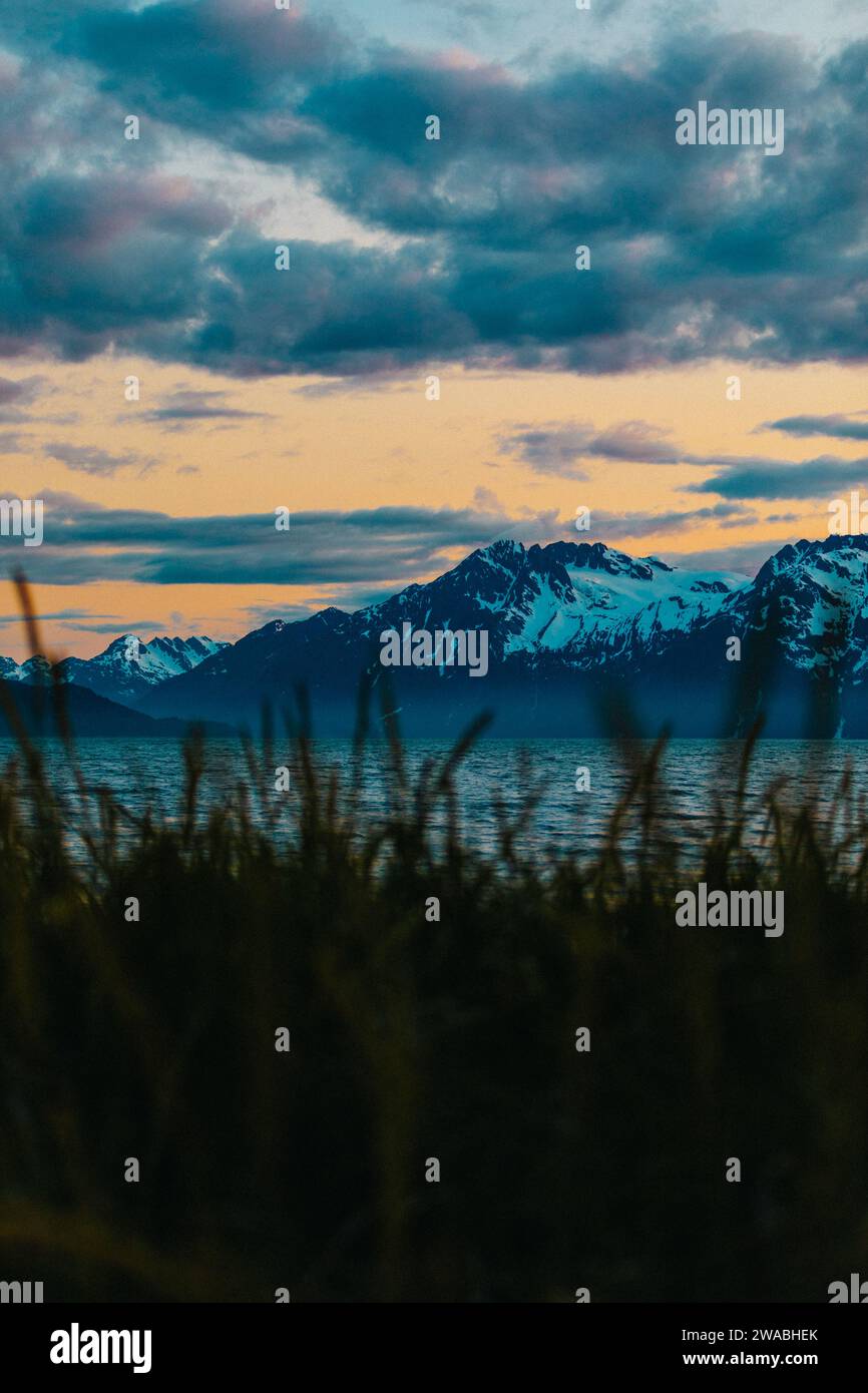 Sunrise over mountains fjord lakeside hi-res stock photography and ...