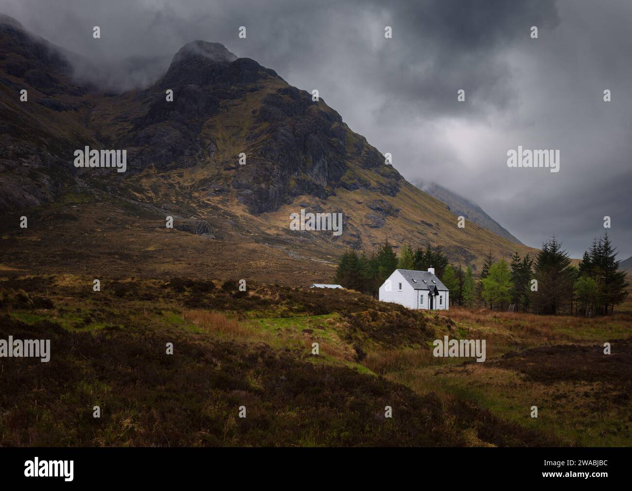 Photograph of White cottage during the winter in sceninc Glencoe ...