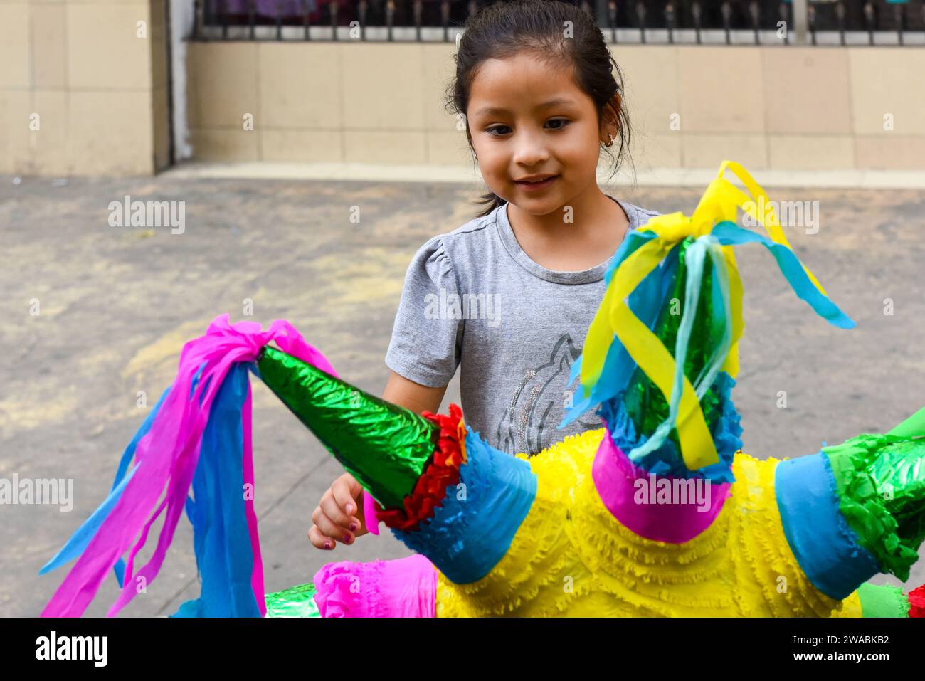 Mexican girl with a pinata hi-res stock photography and images - Alamy