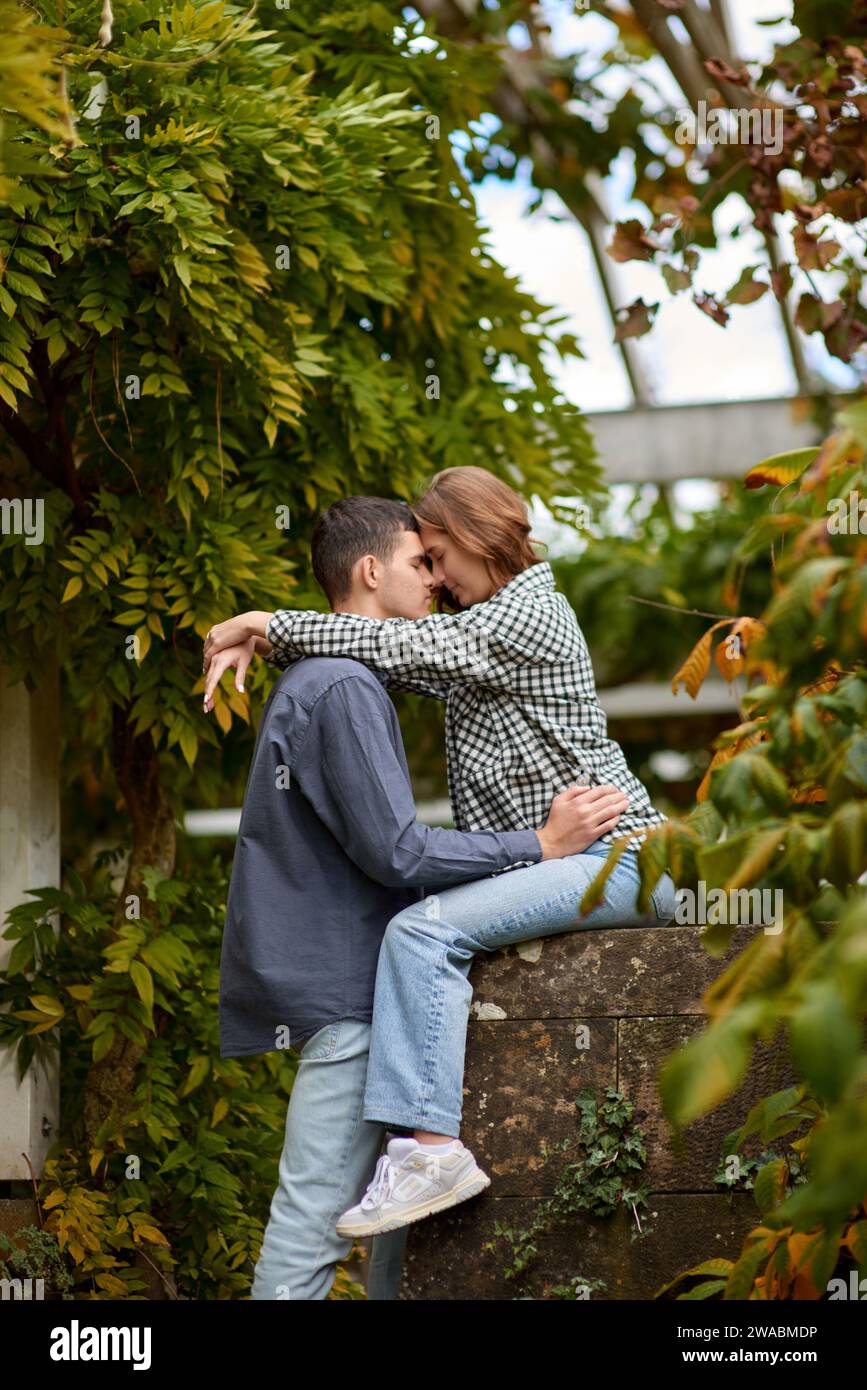 Love's Moments: A Young Cute Female Hugs Her Boyfriend in the ...