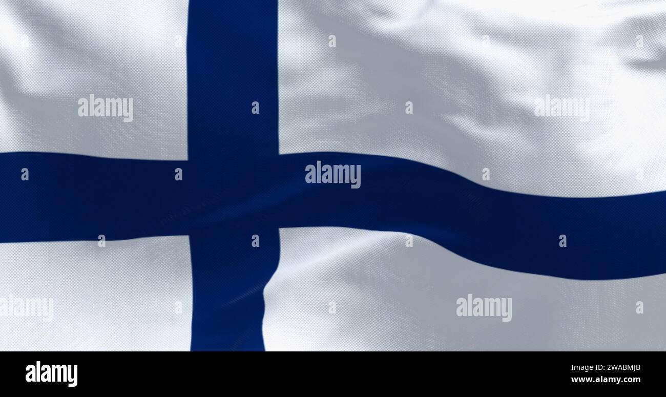 Close-up of national flag of Finland waving in the wind. Blue Nordic ...
