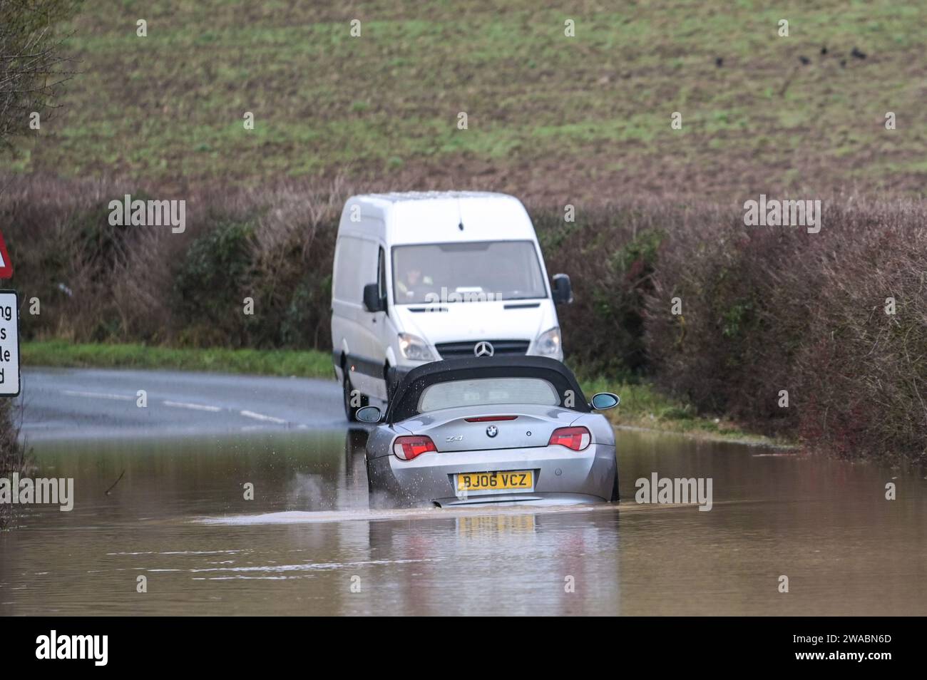 Vehicle submerged in flood hi-res stock photography and images - Alamy