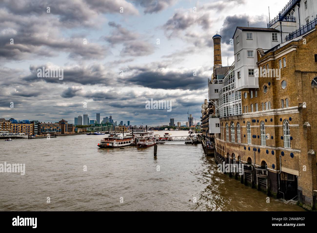 River Thames With Boats And Docks Beneath Butler's Wharf From Tower ...