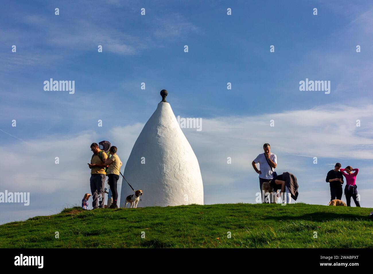 Walkers near White Nancy a structure overlooking Bollington Cheshire ...